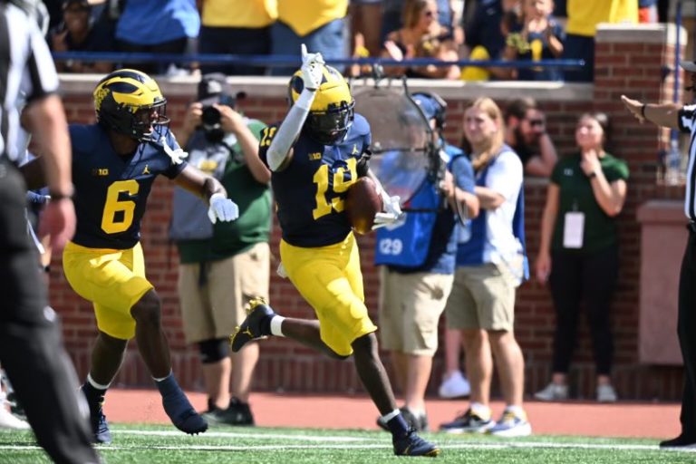 Rod Moore And 2022 Michigan Wolverines Football Team On Defense Set A